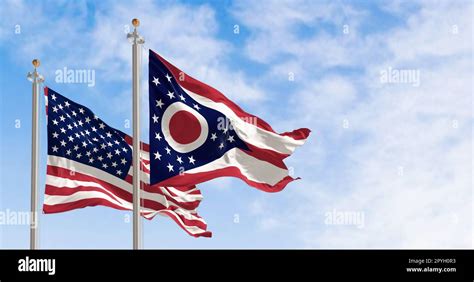 The Ohio State Flag Waving Along With The National Flag Of The Us Stock