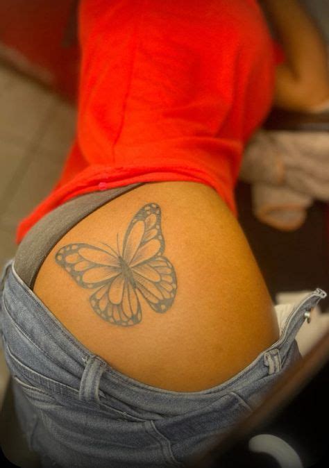 Butterfly On Buttocks Tattoo