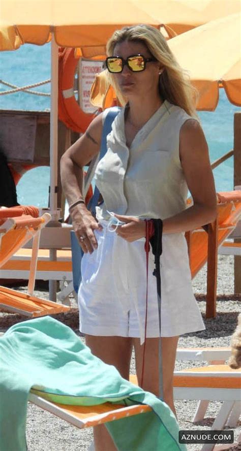 Michelle Hunziker Enjoys A Day On The Beach In Varigotti AZNude
