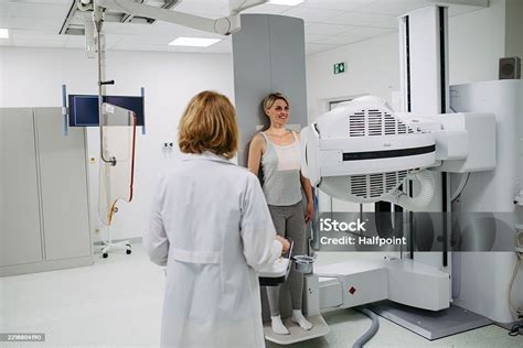 Doctor Operating Dynamic Xray Scan Using Tilting Fluoroscopy Unit Stock