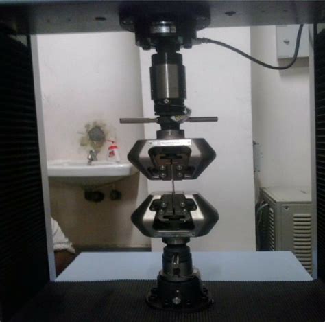 Specimen Under A Tensile Test Download Scientific Diagram