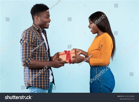 A Man Giving Woman T