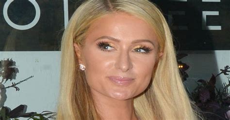 Paris Hilton Is The Ultimate Barbie Girl In Pink Pin Flashing Minidress