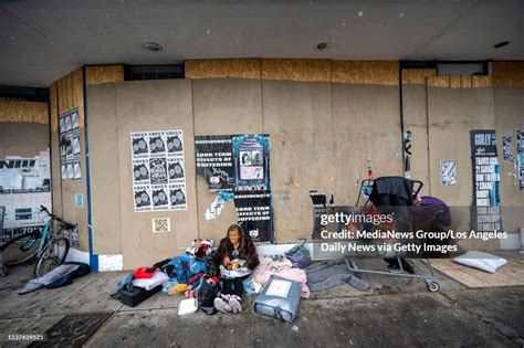 Deborah Knapp 51 Years Old Uses An Awning From A Business In The