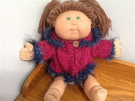 Ravelry Hooded Sweater For A Cabbage Patch Doll Pattern By Janice Helge