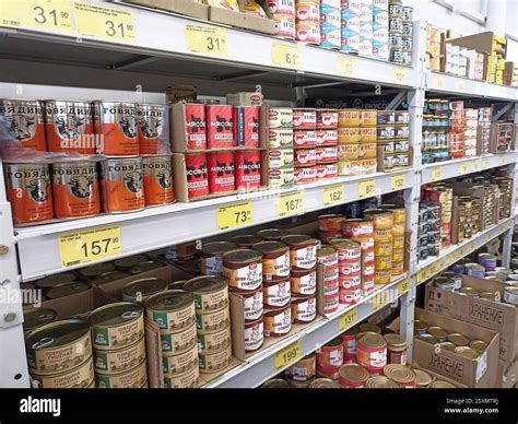 Canned Goods Aisle In Grocery Store With Diverse Variety And Pricing In
