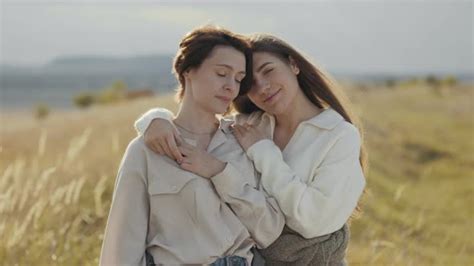Couple Of Two Loving Lesbians Embracing On Camera Outdoors Stock Footage