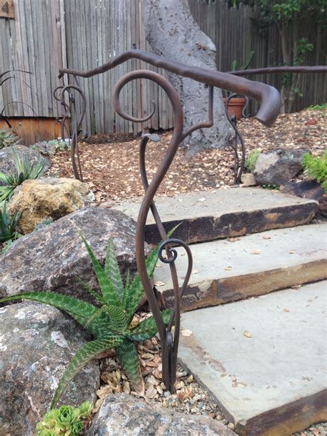 Landscaped Steps With Curved Metal Handrail Artofit