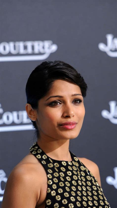 Download Stunning Portrait Of Freida Pinto Wallpaper