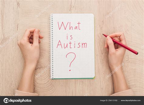 Cropped View Woman Holding Marker Notebook What Autism Question Wooden