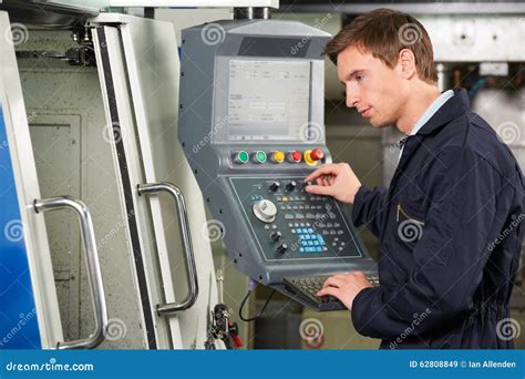 Engineer Using Computer Controlled Cutting Machine Stock Image Image