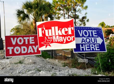 Bilingual Spanish English Voting Precinct Signs In Front Of A Polling