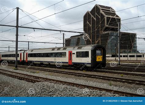 Electrical Train Of Belgian Railways And Hasselt Courthouse Editorial