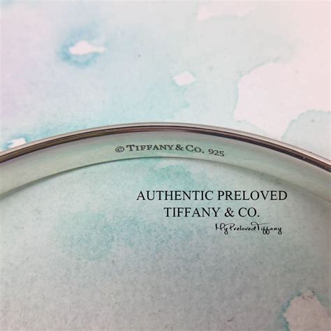 Excellent Authentic Tiffany And Co Logo Script Notes Cursive Bangle Silver Womens Fashion