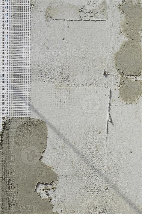 The Texture Of The Wall Covered With Gray Polystyrene Foam Plates Which Are Coated With A