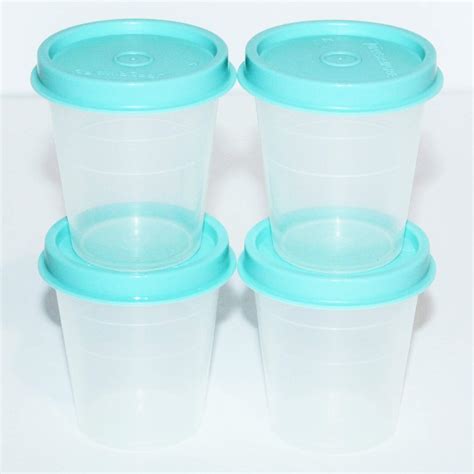 Tupperware Set Of 4 Smidgets Tiny 1 Oz Containers Sheer With Aqua Lids Home And Kitchen
