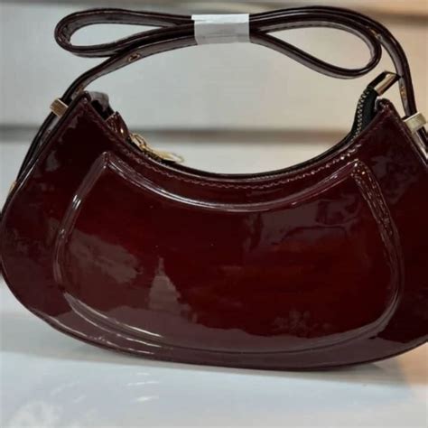 خرید و قیمت کیف آلبالویی ورنی از غرفه پوشاک لالیک