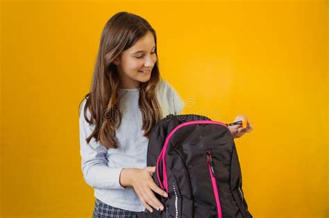 Portrait Of Little Cute Girl Collects Backpack To School Stock Image Image Of Camera