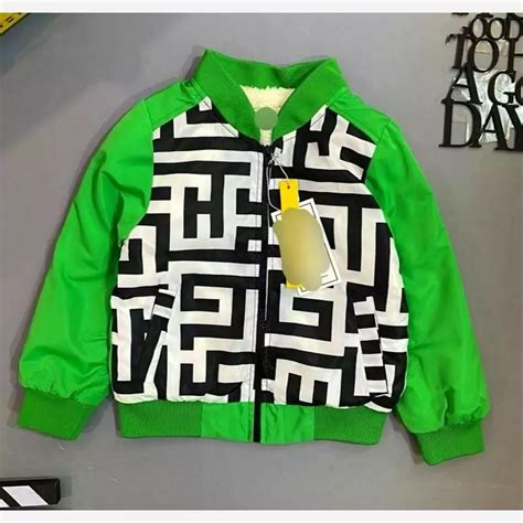 خرید و قیمت کاپشن بچه گانه اسپورت خواهر برادری طرح فندی 35تا55 طرح Hey رنگ قرمز و سبز جنس شمعی