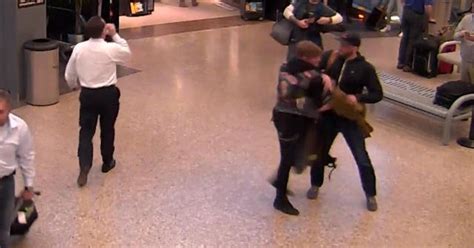 Airport Scuffle Caught On Camera Cbs News