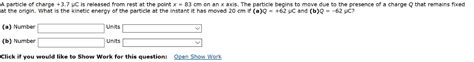 solved a particle of charge 3 7 μc is released from rest at