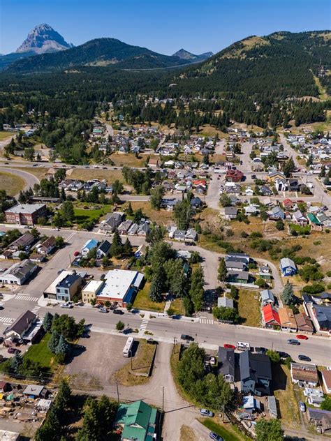 Aerial Crowsnest Pass Town With Coal Mining History Overlooking Distant