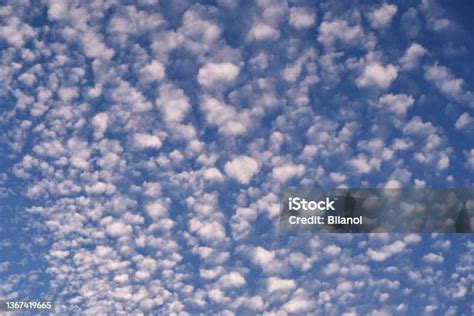 Bright Landscape Of White Puffy Clouds Spread On Blue Clear Sky Stock
