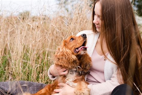 Premium Photo Adorable Cocker Spaniel With Woman