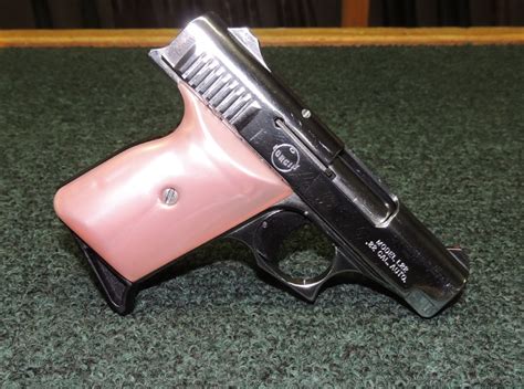 Lorcin Engineering Co Inc Model L22 22lr With Pink Grips No Reserve For Sale At Gunauction