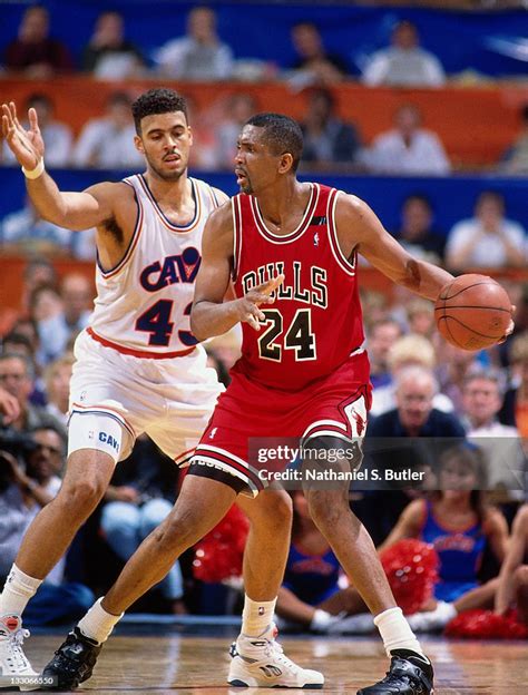 Bill Cartwright Of The Chicago Bulls Dribbles Against Brad Daugherty