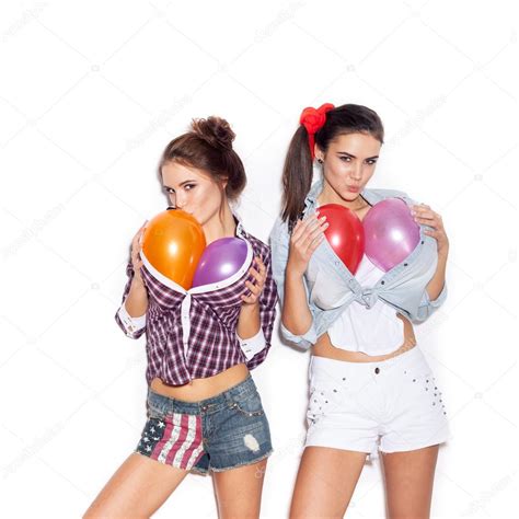 Two Girl Friends Make Artificial Breasts With The Help Of Colored