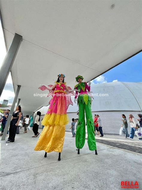 Hire Festival Stilt Walkers In Singapore Bella Entertainment