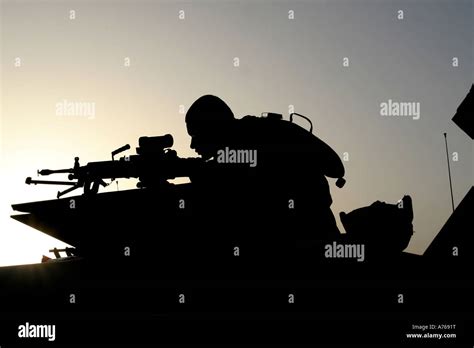 Squad Automatic Weapon Saw Gunner Looks Through The Sights Of His