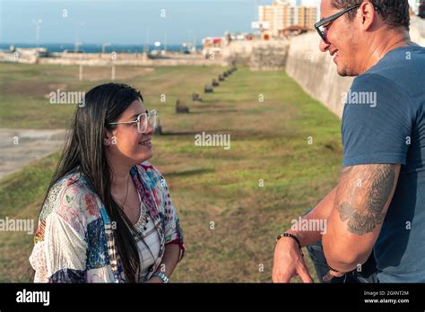 Latina Woman And Her Partner Sharing A Moment Stock Photo Alamy