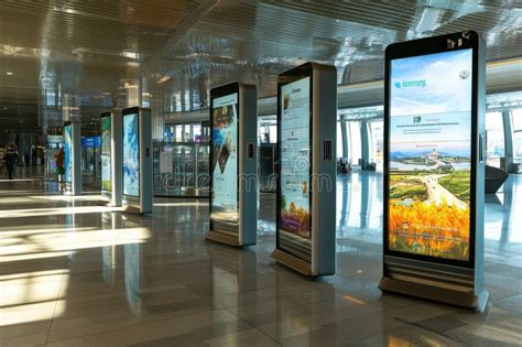 Digital Signage Displays In A Modern Airport Terminal During Daylight