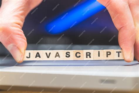 premium photo javascript programming web language wooden cubes with letters javascript lying