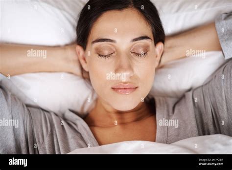Catching Up On Her Beauty Sleep An Attractive Young Woman Asleep In