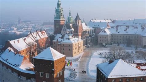 Snow Covered Wawel Castle At Magic Morning With Soft Sun Light During