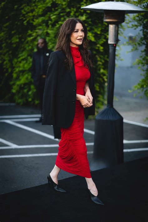 Catherine Zeta Jones Wears Asymmetrical Ruched Red Hot Bodycon Dress