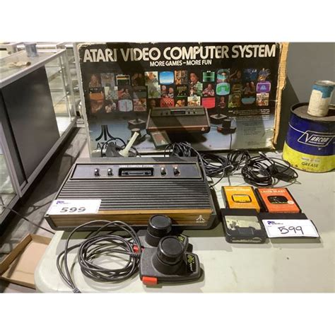 Atari Video Computer System With Paddle Controls Power Supply And 4 Games