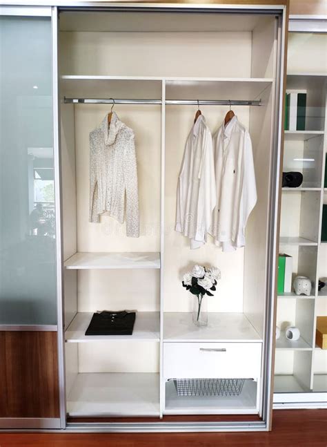 Room With The Open Empty Closet Working Closet Cupboard With Some Racks Interior Design Stock