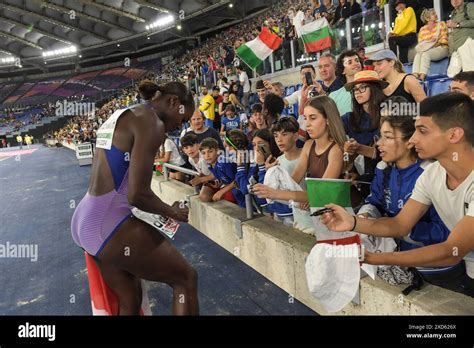Dina Asher Smith Of Great Britain Signing Autographs After Winning The