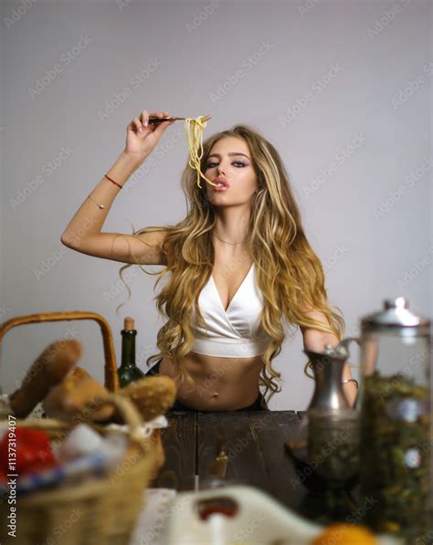 Sexy Woman Bites Sensually Cooked Spaghetti Sensually Twirling The