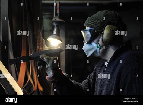 Cuttler Andreas Schweikert Checks A Knife At His Workshop In Moessingen Germany 9 December