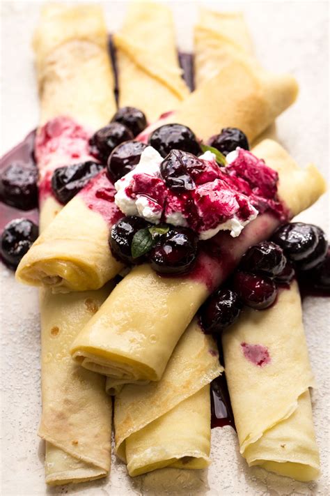 French Crepe Recipe With Custard Filling And Blueberry Sauce Topping
