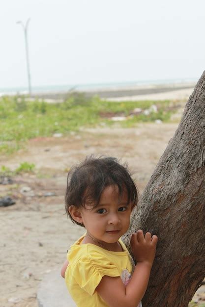 Premium Photo Portrait Of Cute Girl At Beach