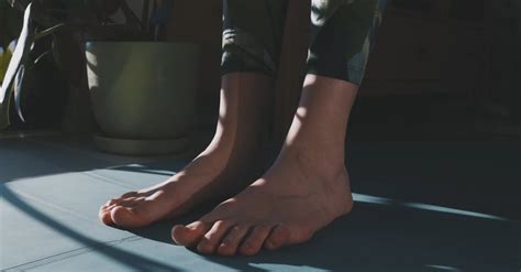 Close Up Of A Woman Touching Her Toes Free Stock Video Footage Royalty