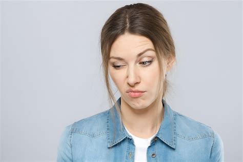 Premium Photo Closeup Portrait Of Skeptical Young Woman With Makeup