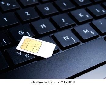 Sim Card On Laptop Keyboard Represents Stock Photo 71171848 Shutterstock