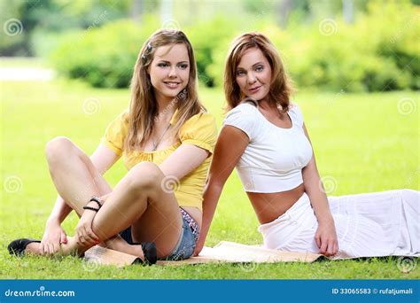 Two Beautiful Girls Hanging In The Park Stock Image Image Of